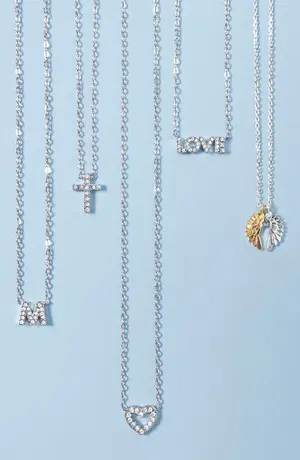 Estée Lauder Wing Pendant Necklace