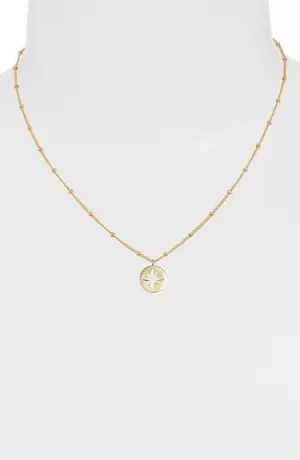 Estée Lauder Starburst Disc Pendant Necklace