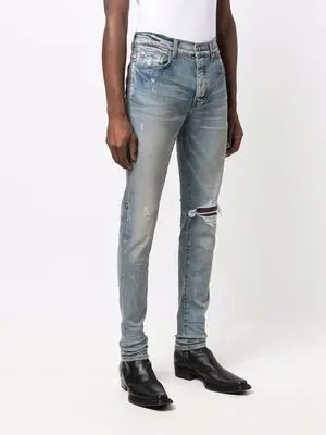 Amiri Distressed Skinny Jeans