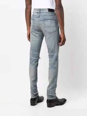 Amiri Distressed Skinny Jeans