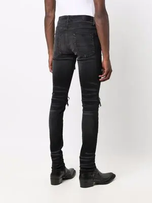 AMIRI×PLAYBOY MAGAZINE JEANS BLACK Amiri X Playboy Skinny Jeans - Black | Editorialist