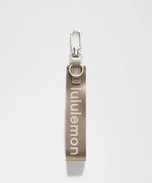 Lululemon Never Lost Keychain Warm Ash Grey/light Ivory