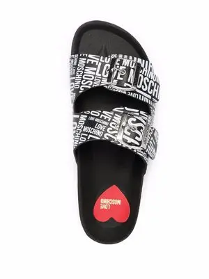 Moschino All-over Logo Print Flat Sandals