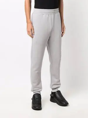 A-COLD-WALL* Embossed Logo Trackpants - Grey