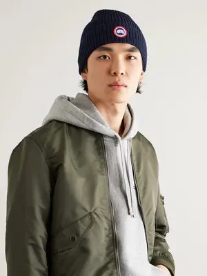 Canada Goose Logo-appliquéd Ribbed Wool Beanie - Blue