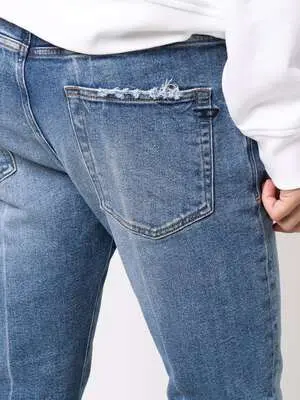 DIESEL® Whiskering Effect Slim-fit Jeans
