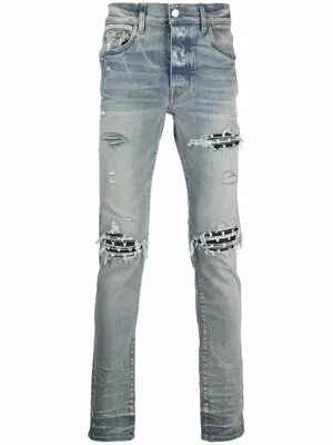 Amiri Ripped-effect Skinny Jeans - Blue