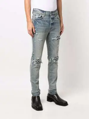 Amiri Ripped-effect Skinny Jeans