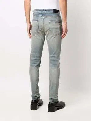 Amiri Ripped-effect Skinny Jeans