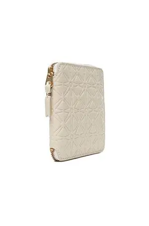Comme Des Garçons Star Embossed Zip Fold Wallet In White