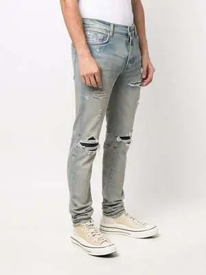 Amiri Mx1 Distressed Skinny Jeans - Blue