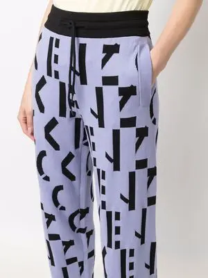 Kenzo All-over Logo Print Trousers - Purple