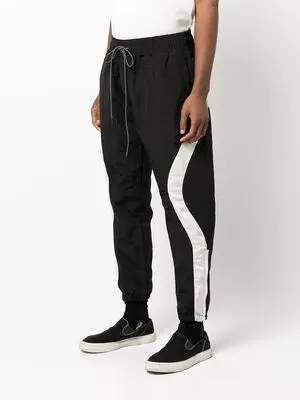 MOSTLY HEARD RARELY SEEN Wave Stripe-print Track Pants