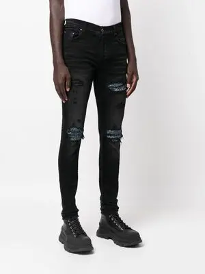 Amiri Distressed Skinny Jeans
