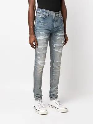 Amiri Distressed Skinny Jeans