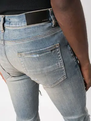 Amiri Distressed Skinny Jeans