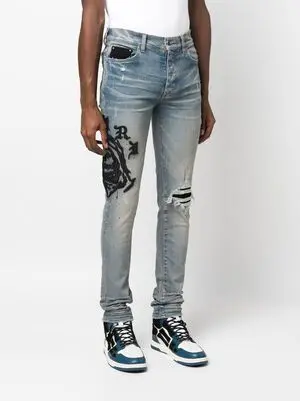 Amiri Logo-embroidered Skinny Jeans