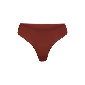 SKIMS Naked Dipped Thong Saffron