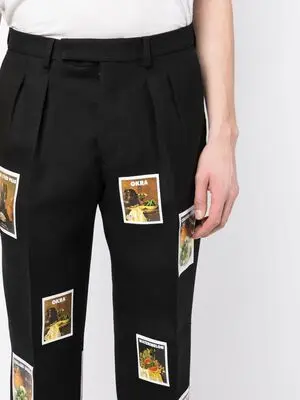 DENIM TEARS Polaroid Print Trousers