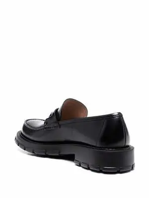 FERRAGAMO Embossed Logo Leather Loafers - Black