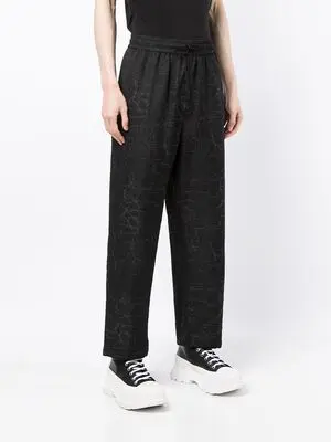 PORTS V All-over Logo Print Trousers