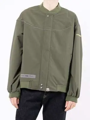 A BATHING APE® World Gone Mad Bomber Jacket