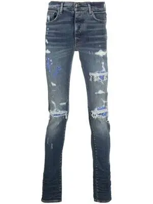 Amiri Raw Edge Hem Jeans For Men