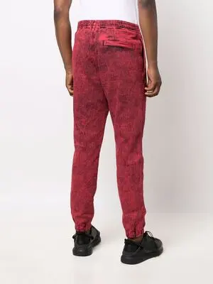 DIESEL® D-lab Joggjeans® Track Trousers With Acid Wash And Logo Patch