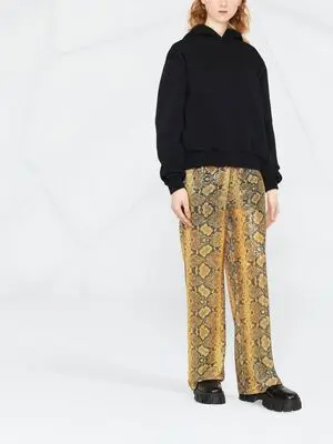 Gcds Snakeskin Print Trousers - Yellow