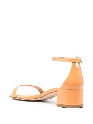 STUART WEITZMAN Nudist Curve Patent Sandals - Orange