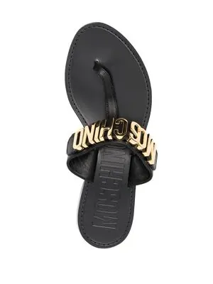 Moschino Plaque Flat Sandals In Black - 50% Off | Editorialist