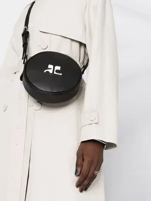 COURREGES Logo-embossed Rounded Crossbody Bag - Black