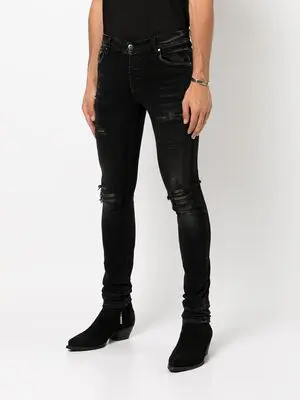Amiri Distressed Skinny Jeans