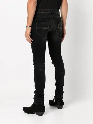 Amiri Distressed Skinny Jeans