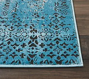 NOURISON HOME Karma Blue 6'7' X 9'6' Area Rug