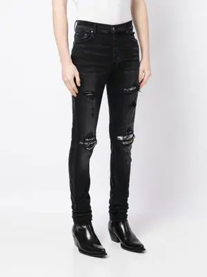 Amiri Distressed Skinny Jeans