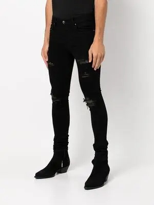 Amiri Ripped-detail Denim Jeans
