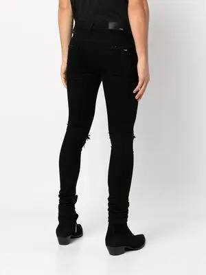 Amiri Ripped-detail Denim Jeans