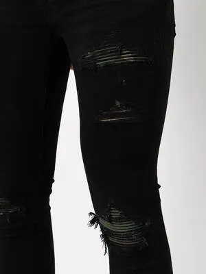 Amiri Ripped-detail Denim Jeans