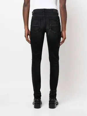 Amiri Logo-appliqué Distressed Jeans
