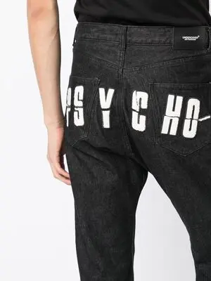 Undercover X Psycho Logo-appliqué Jeans