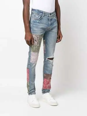 Amiri Distressed Patchwork Skinny Jeans