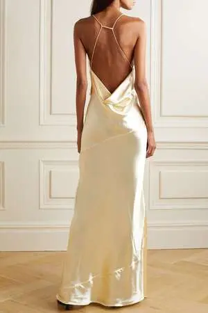 Khaite Nirva Pleated Satin Maxi Dress In Cream - 50% Off | Editorialist