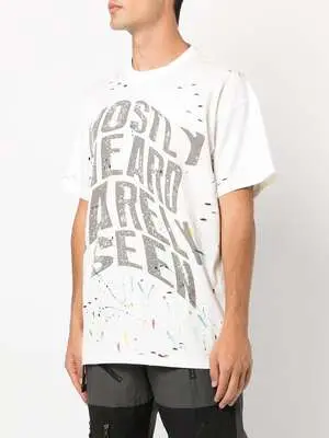 MOSTLY HEARD RARELY SEEN Warped-text Paint T-shirt - White