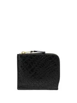 Comme Des Garcons Debossed Wallets For Women