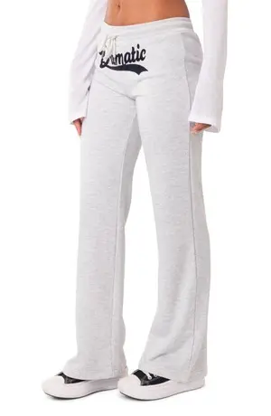 EDIKTED Dramatic Appliqué Low Rise Fleece Pants