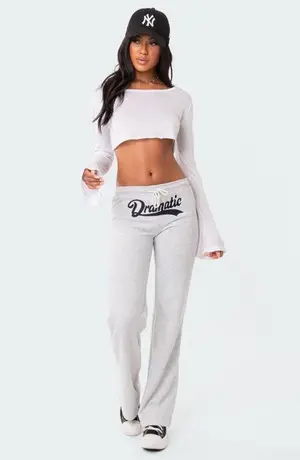 EDIKTED Dramatic Appliqué Low Rise Fleece Pants
