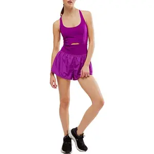 Free People FP Movement Righteous Runsie Romper Vivid Violet