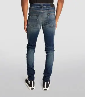 Amiri Distressed Slim Jeans