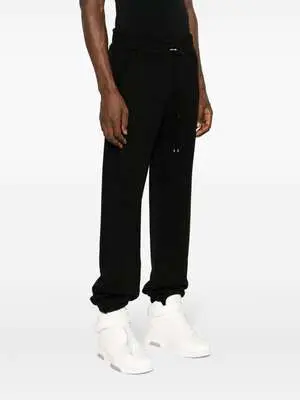 Amiri Staggered Logo-embroidered Track Pants